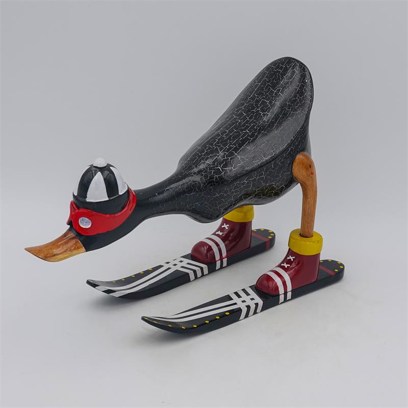 Ente »Felix« - mittel nach vorn gebeugt dunkelgrau mit Ski ...